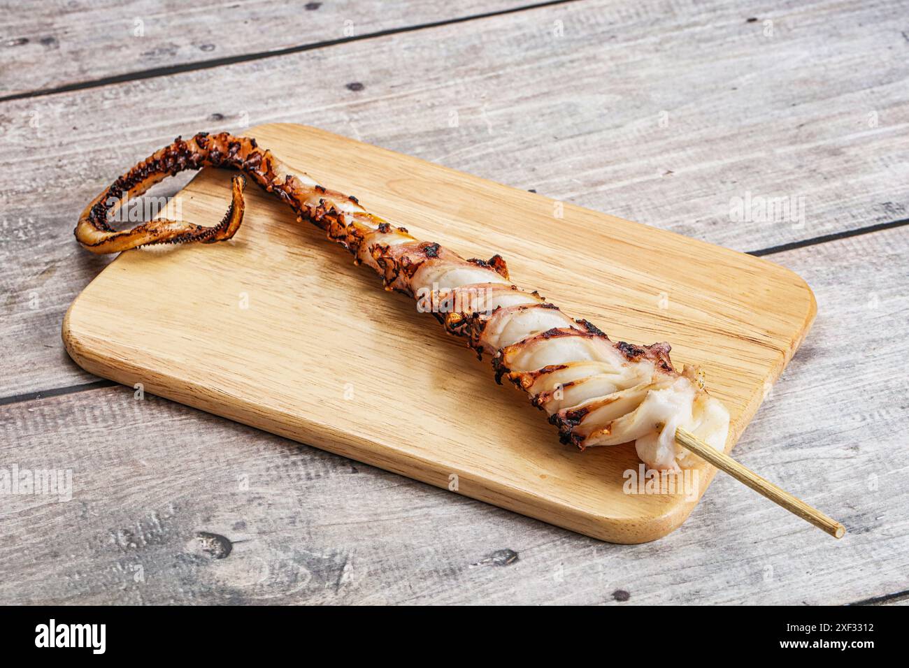 Delicous tasty Grilled octopus tentacle snack Stock Photo - Alamy