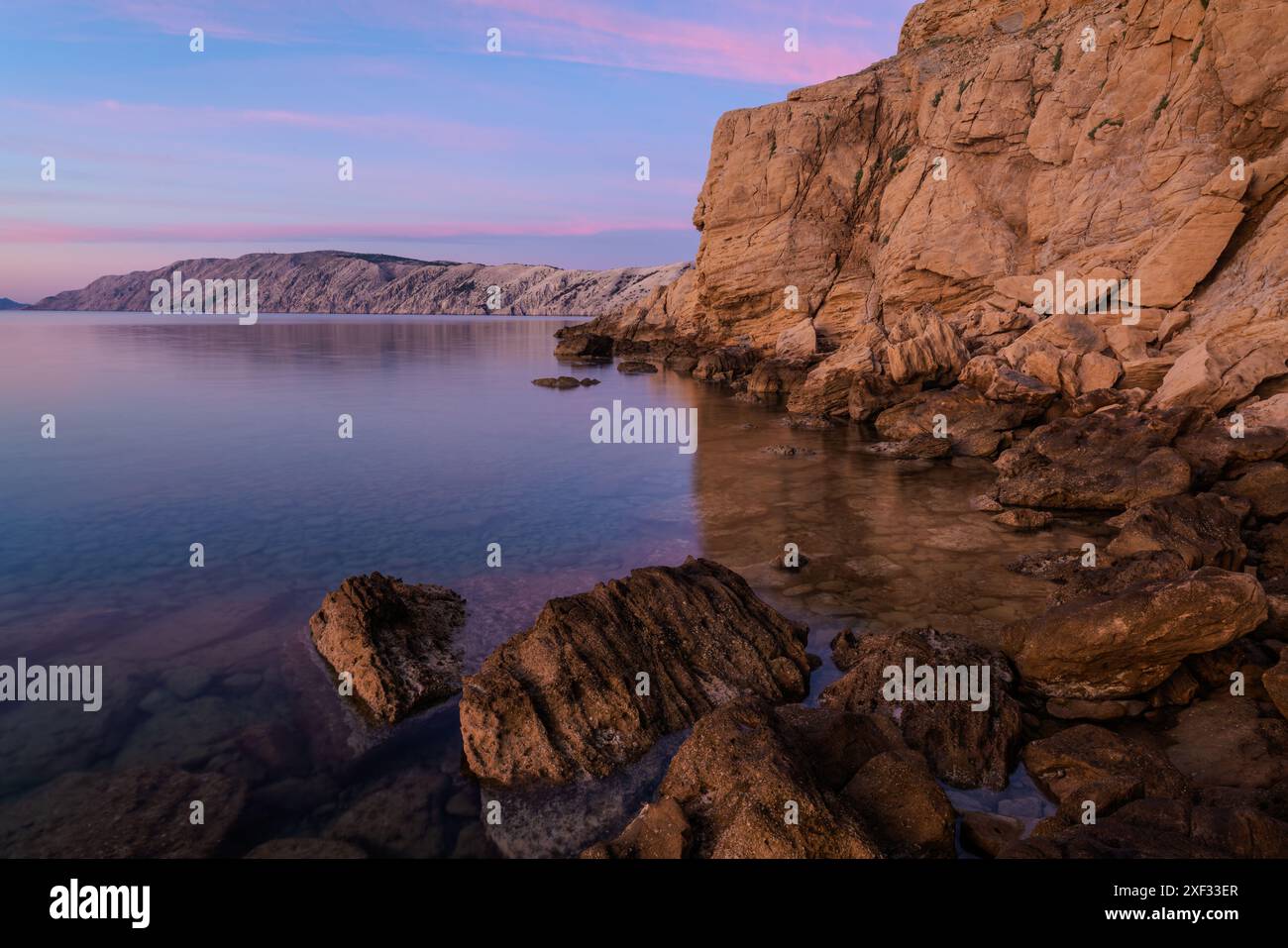 High cliffs in the Geopark on the island of Rab In Croatia during a ...