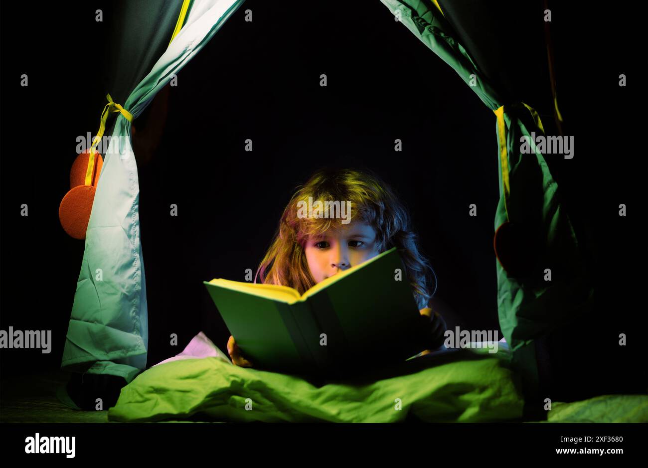 Kids in kids tent reading books. Child reading story with book. Kids ...