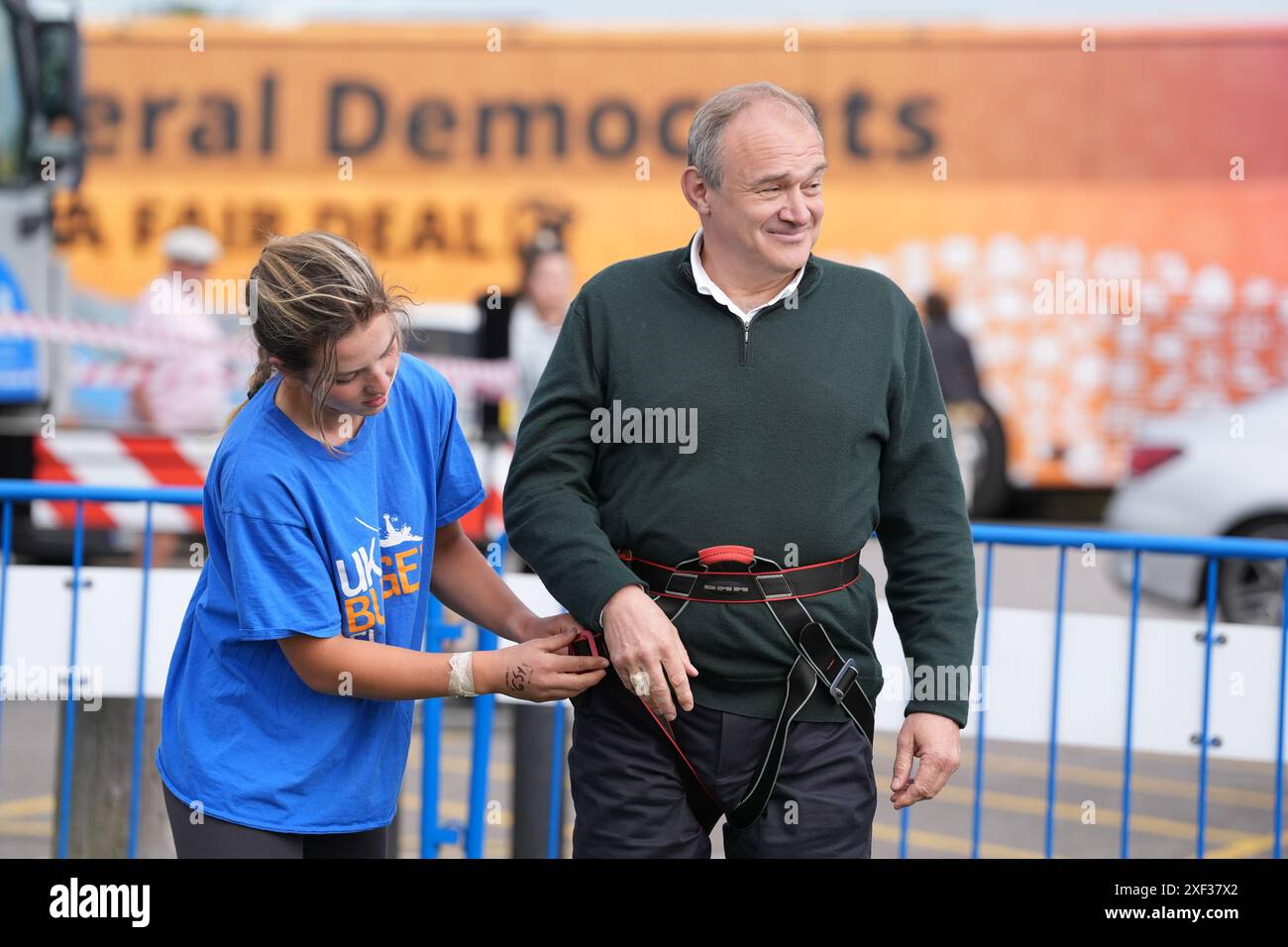 Liberal Democrat leader Sir Ed Davey getting prepared for a bungee jump ...