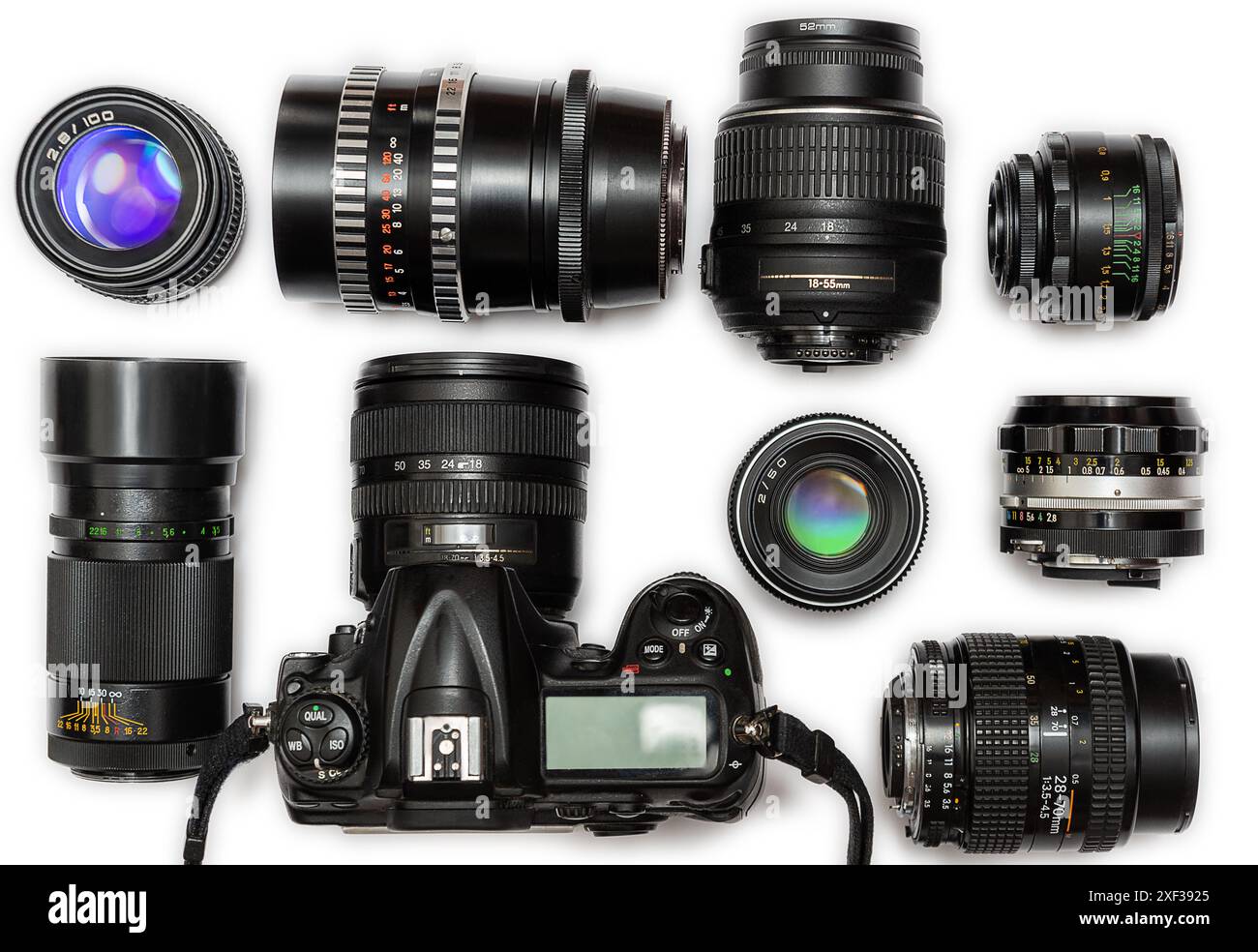A diverse group of camera lenses, ranging from vintage manual focus to ...