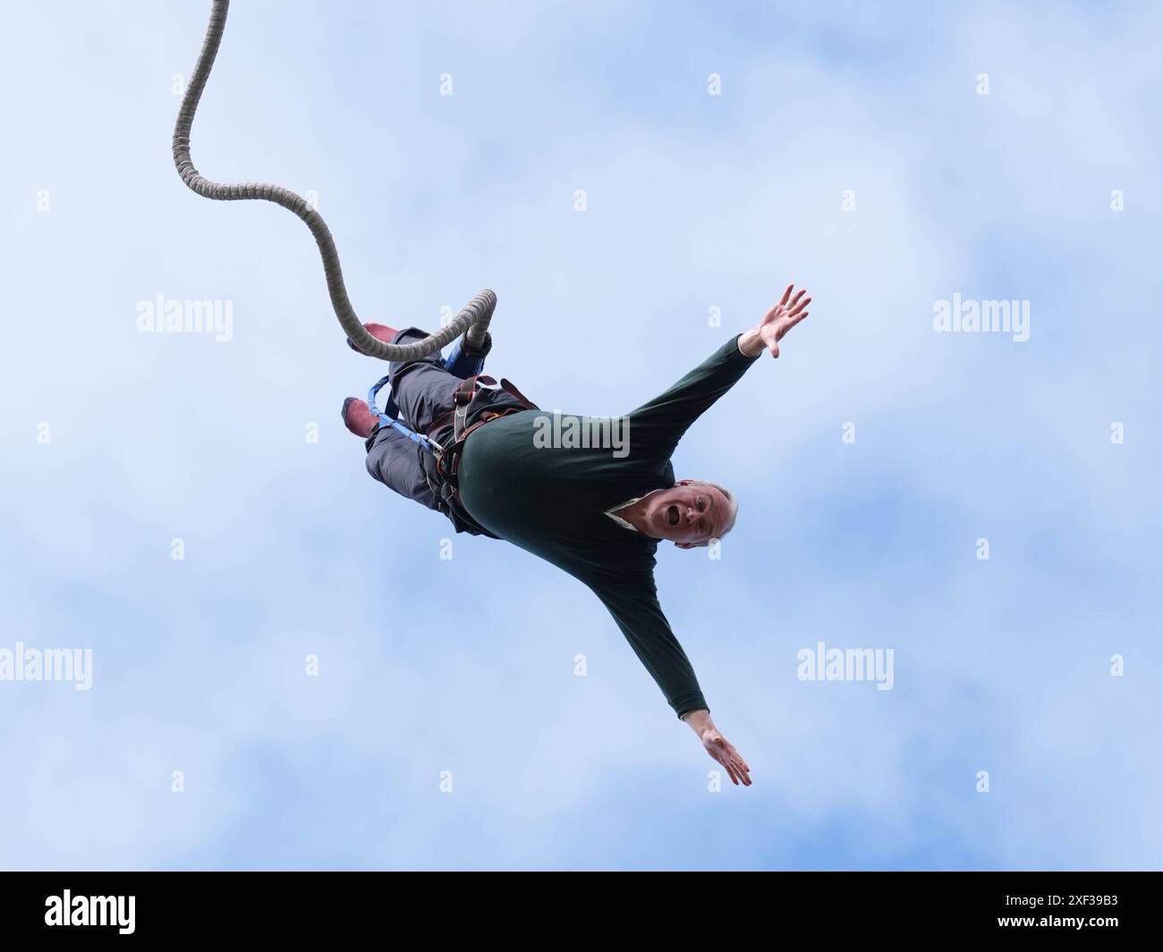 Liberal Democrat leader Sir Ed Davey taking part in a bungee jump ...