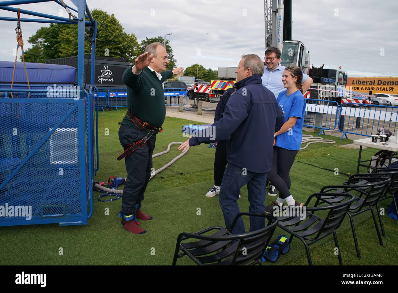 Liberal Democrat leader Sir Ed Davey before taking part in a bungee ...