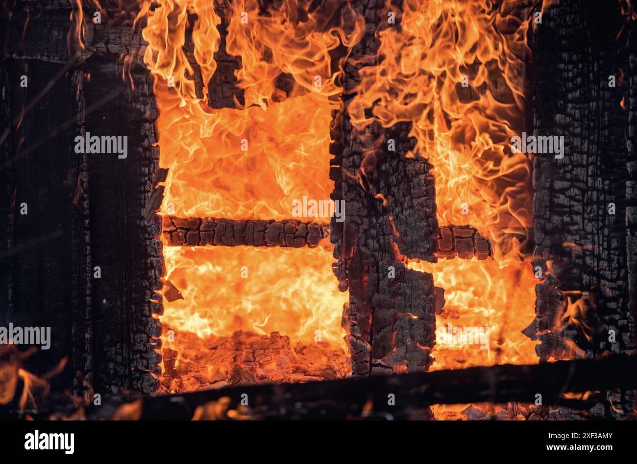 Fire wood engulfed in flames hi-res stock photography and images - Alamy