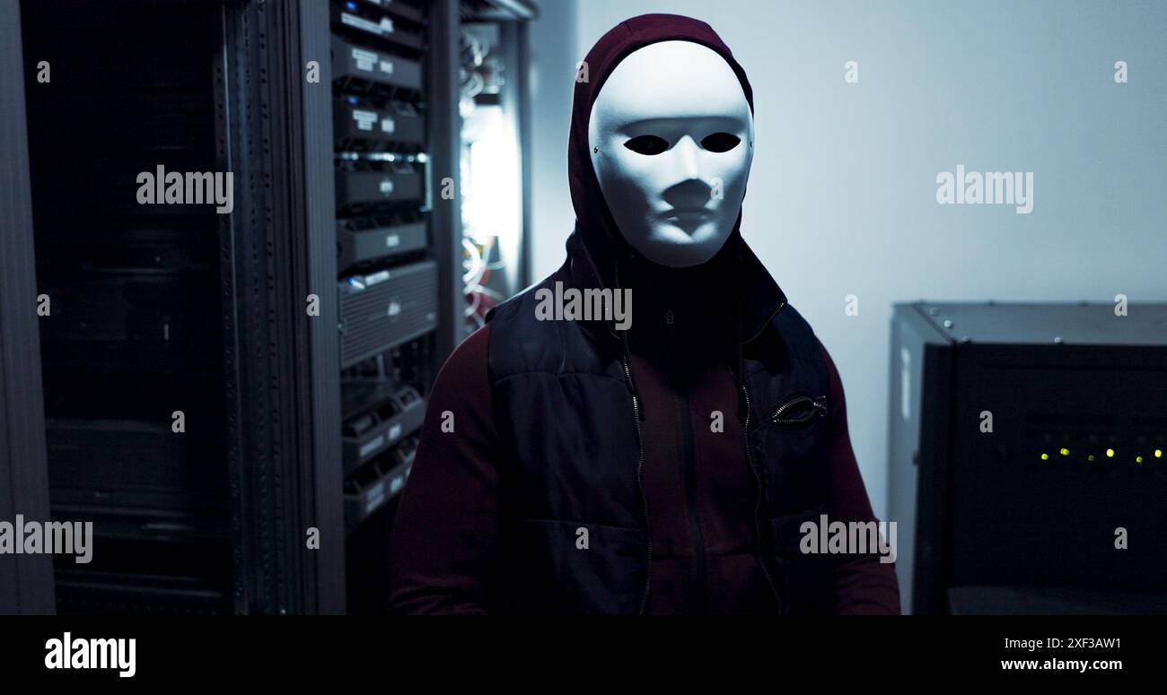 Server room, hacker and person with mask, night and scam of ...