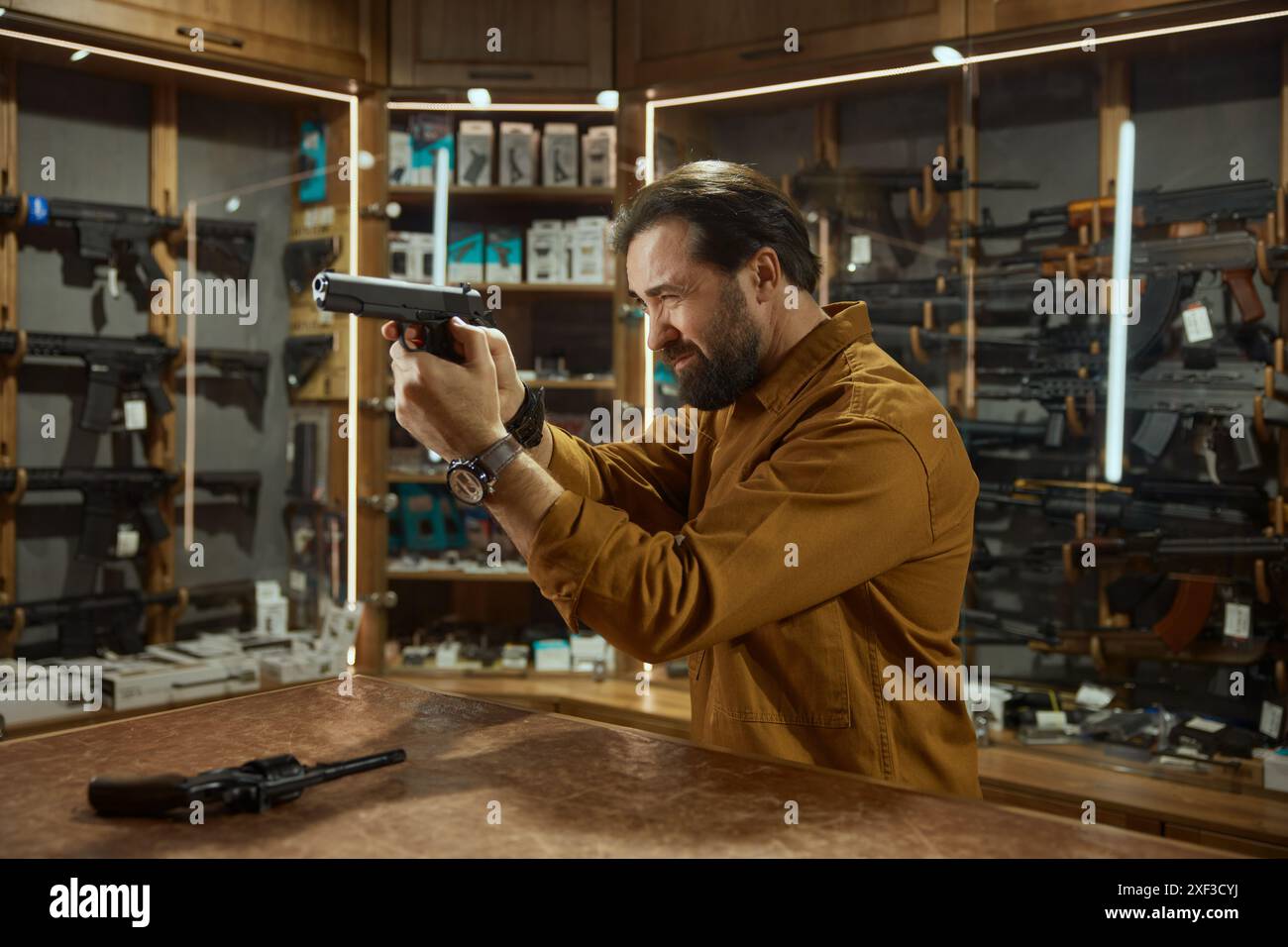 Closeup view on aiming gunpoint selective focus in weapon shop Stock ...