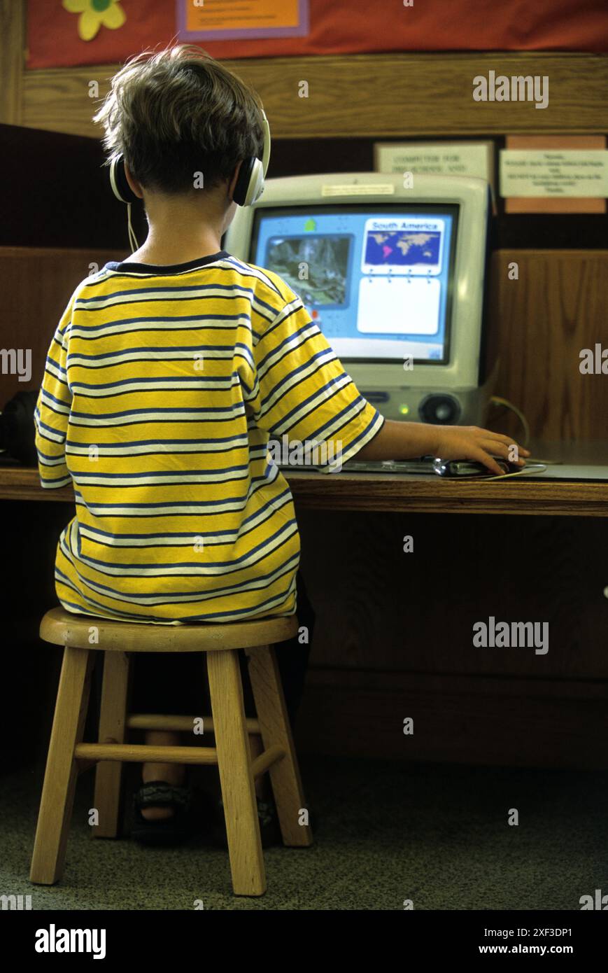 A young boy works on a computer at the Wilkerson Library in Telluride ...