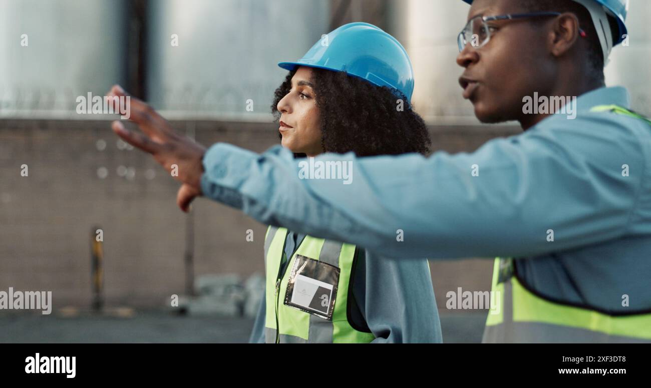Construction worker, team and discussion with strategy at logistics ...