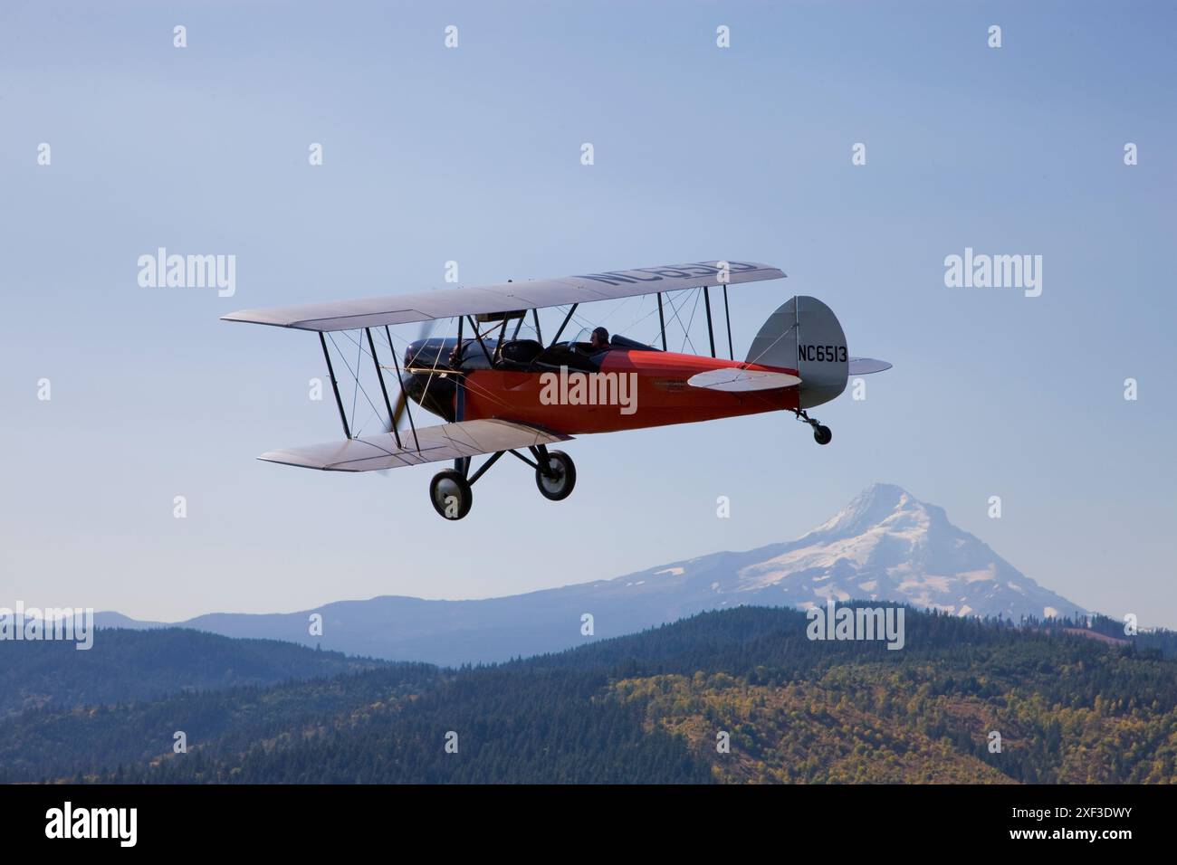 Antique plane flies over Hood River Valley, Oregon Stock Photo - Alamy