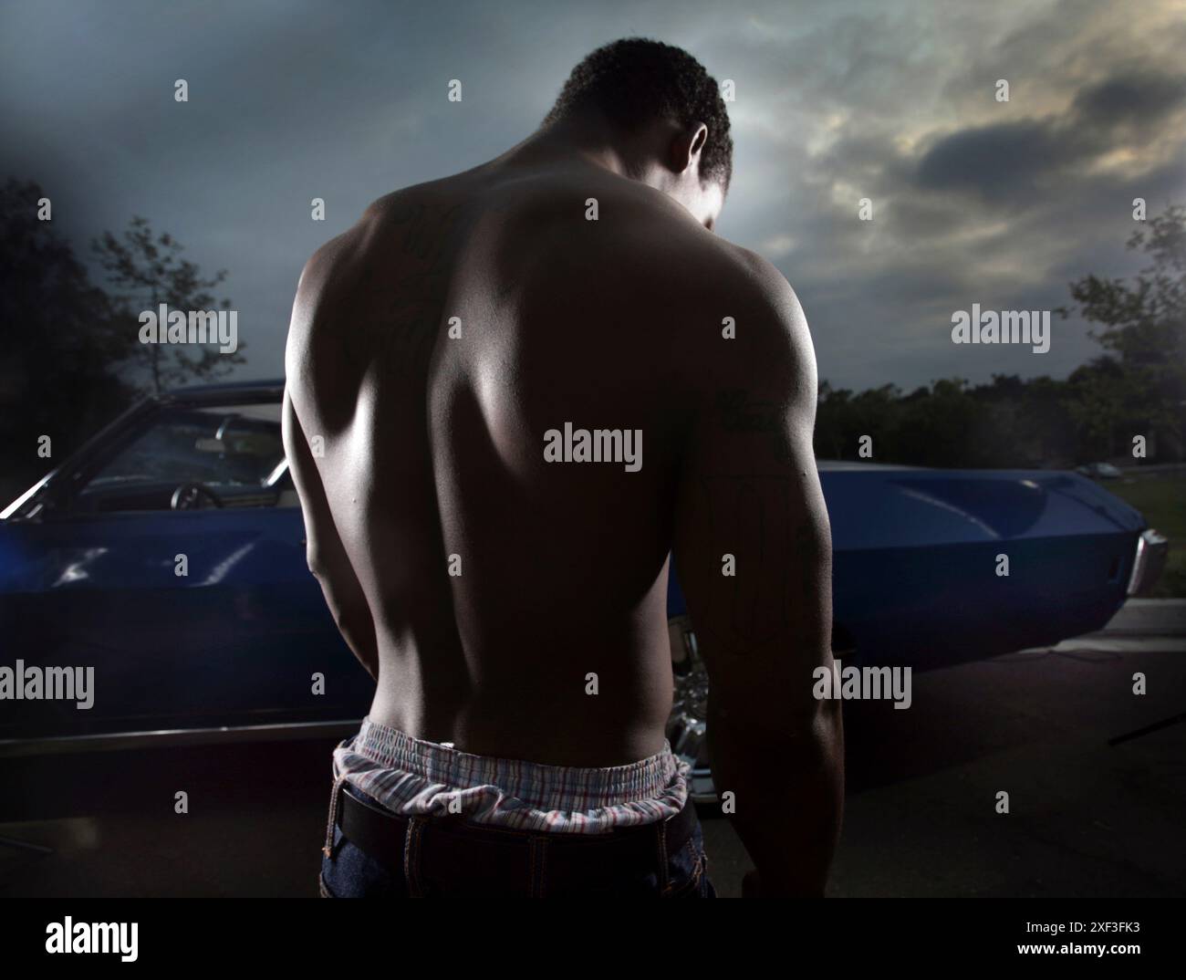 Rapper with classic car Stock Photo - Alamy