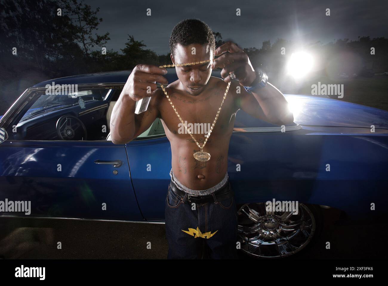 Rapper with classic car Stock Photo - Alamy