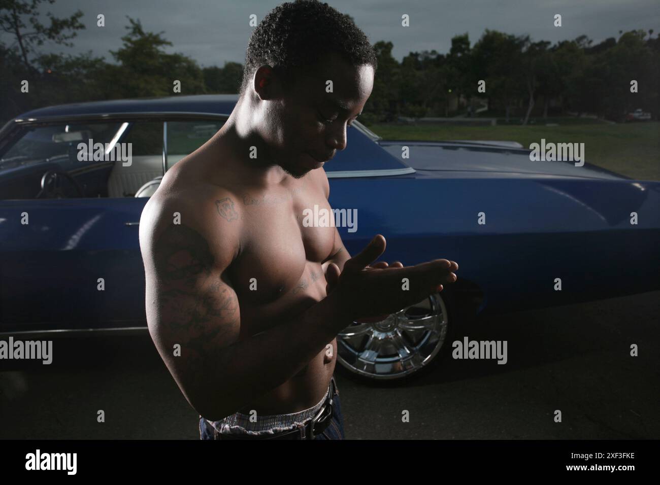 Rapper with classic car Stock Photo - Alamy
