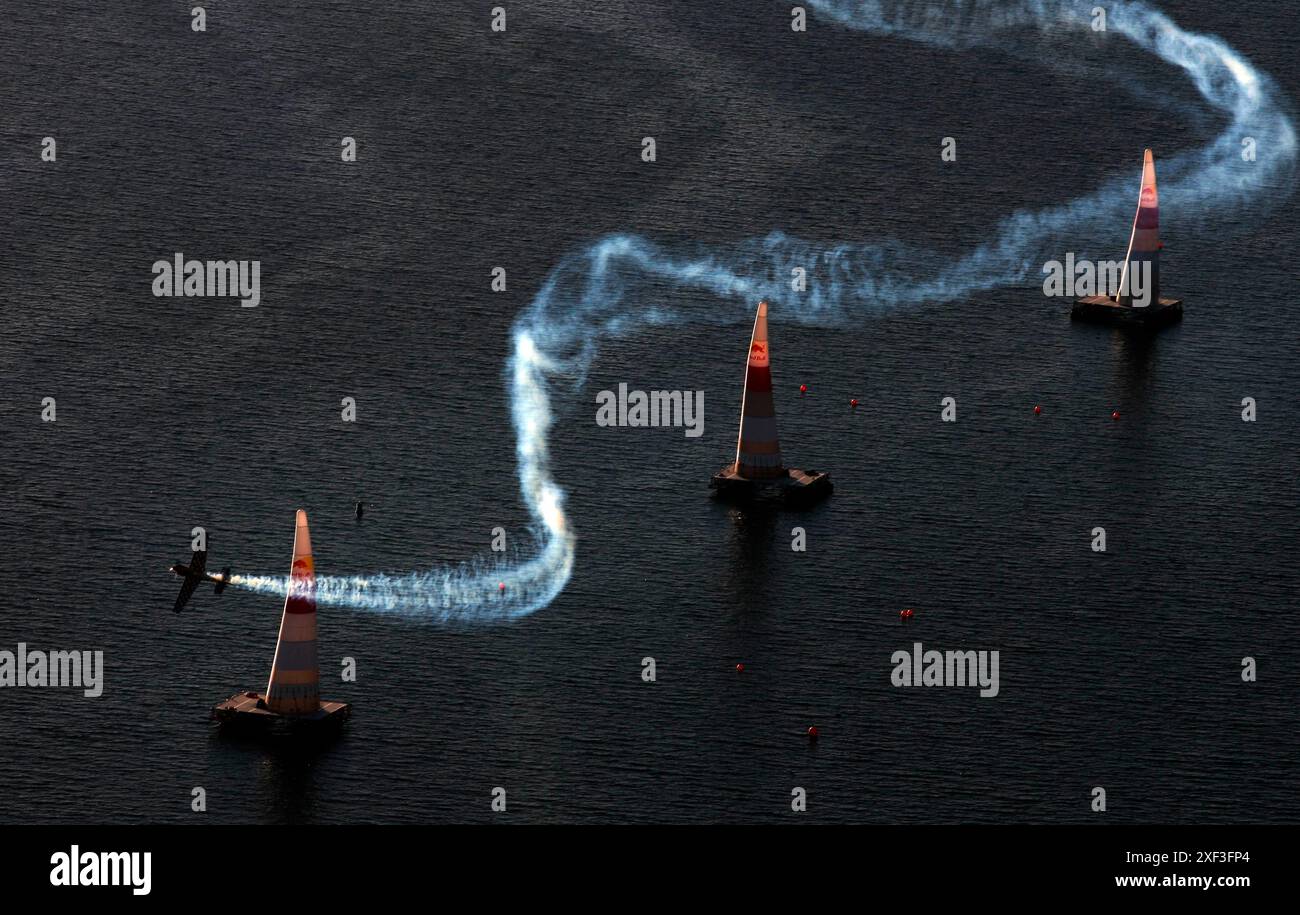 Airplane race over water Stock Photo - Alamy