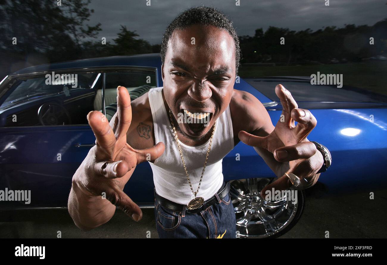 Rapper with classic car Stock Photo - Alamy
