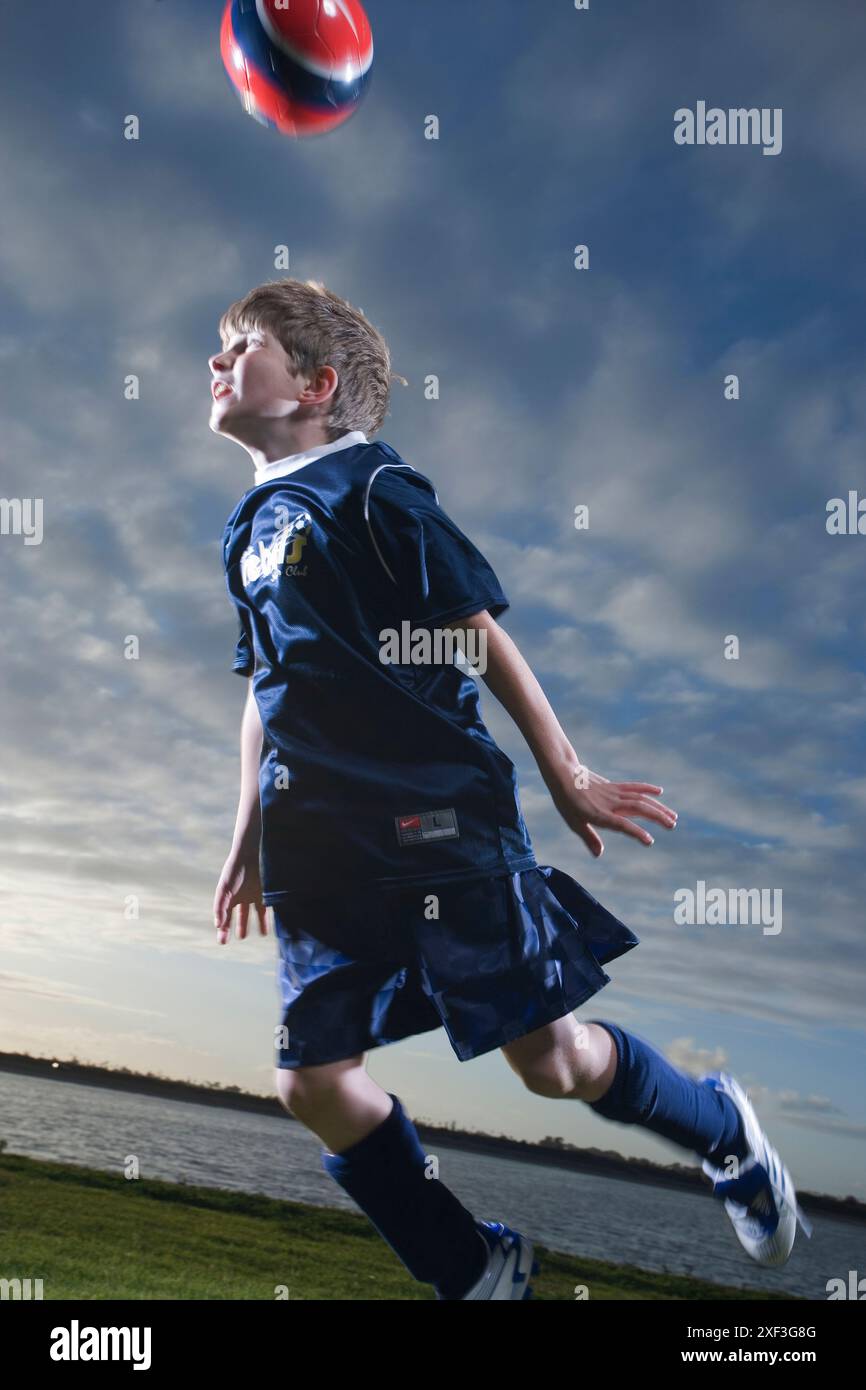 Boy kicks a soccer ball, San Diego, California Stock Photo - Alamy