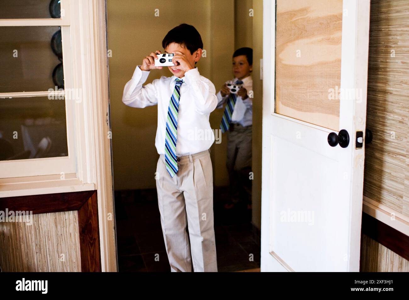 Child with photographic camera taking a picture Stock Photo - Alamy
