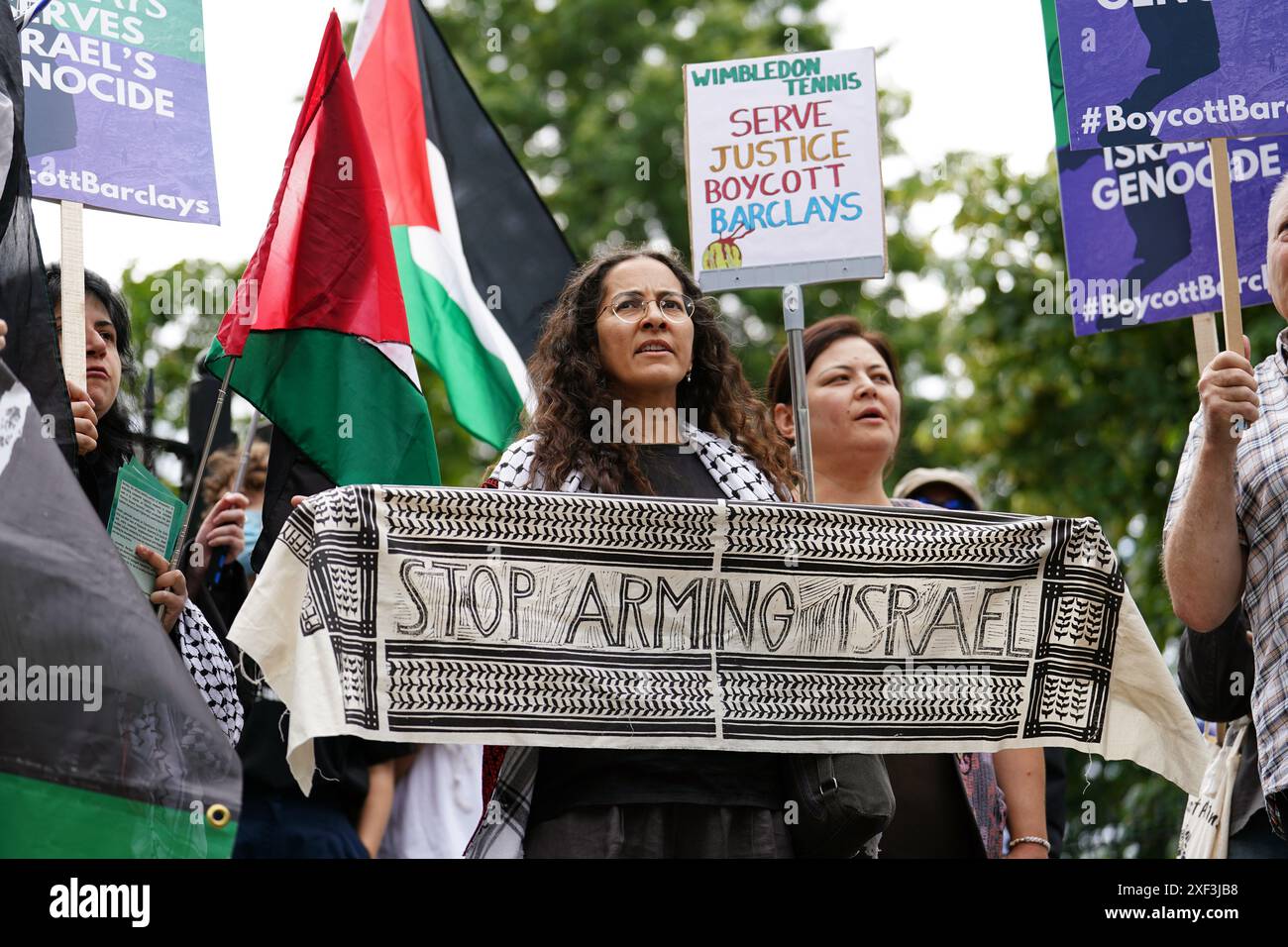 People protesting against Barclays sponsorship of the Wimbledon ...
