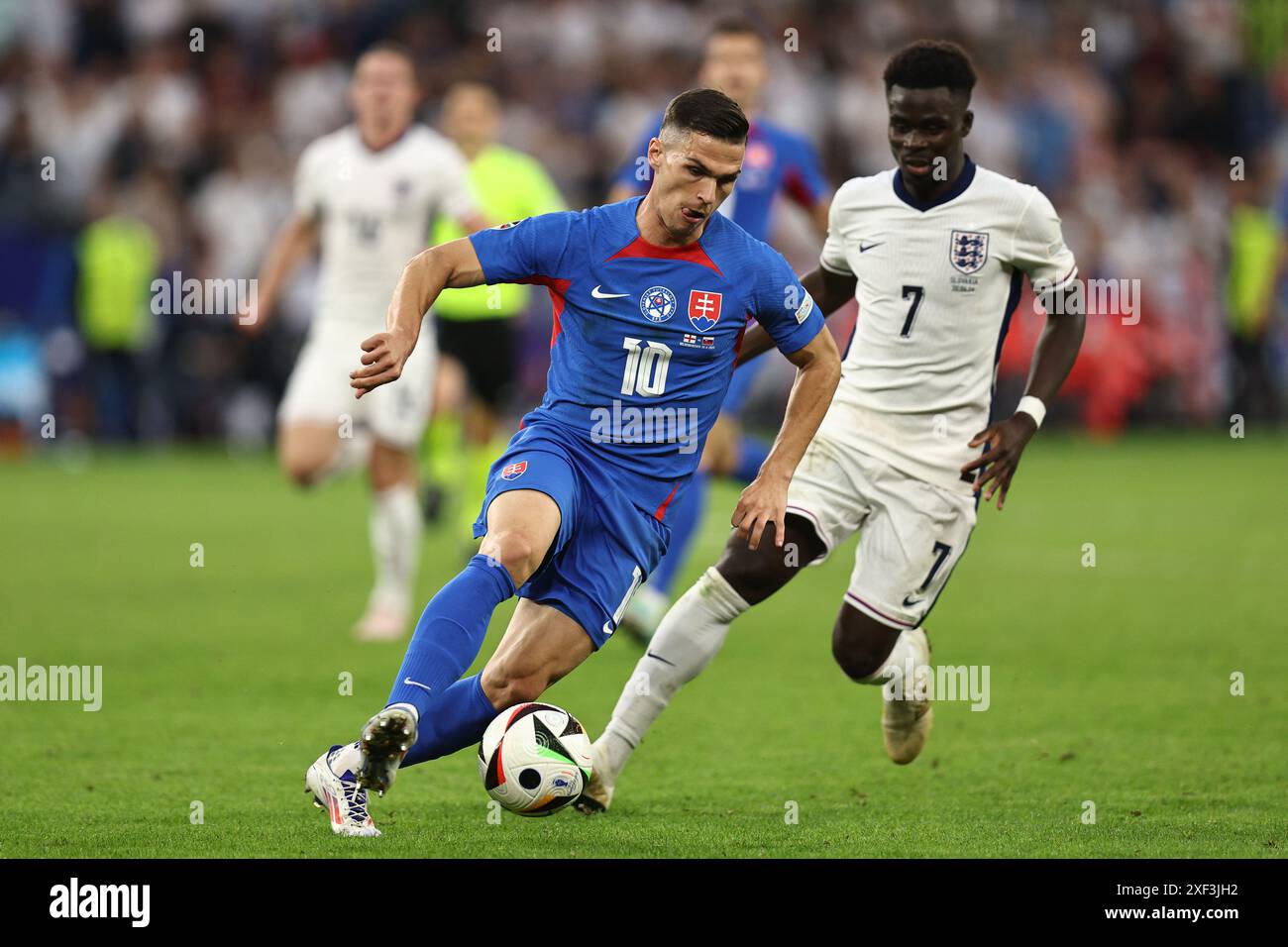 Lubomir Tupta (Slovakia)Bukayo Saka (England) during the UEFA Euro ...
