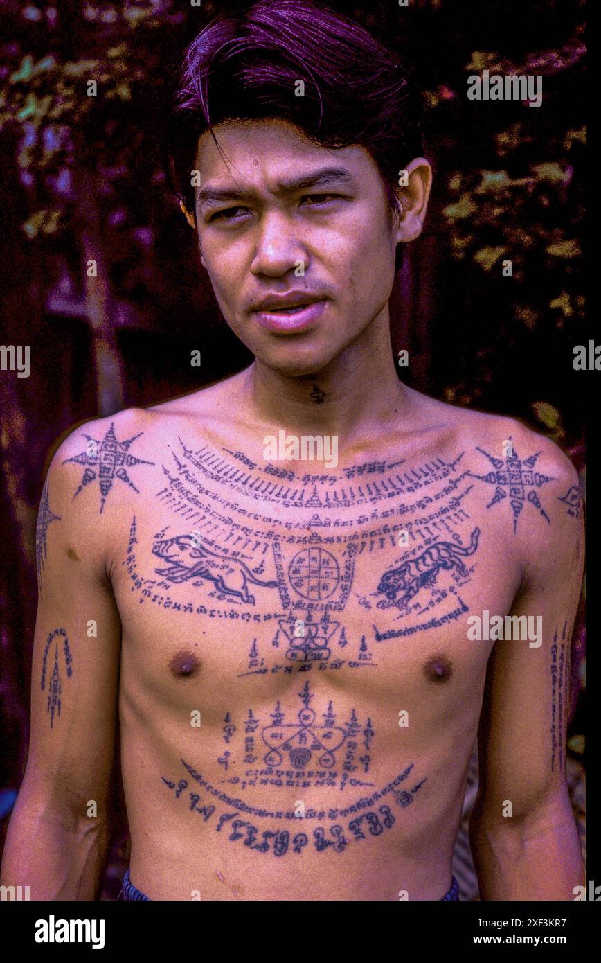 Thailand, man with traditional thai tattoos on the chest Stock Photo ...