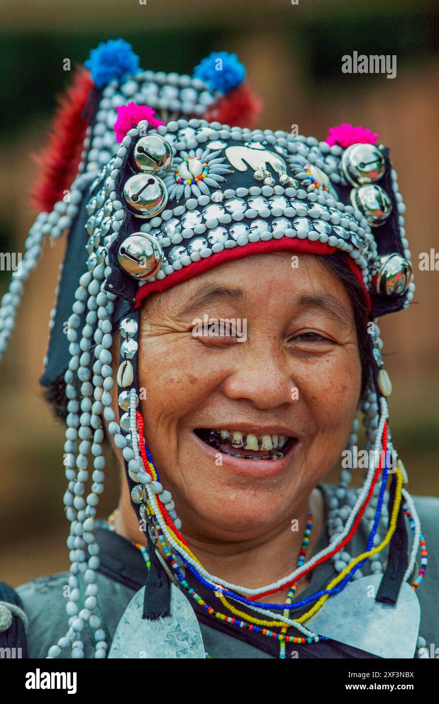 Thailand, Chiang Mai province; Woman of the Akha tribe wearing ...
