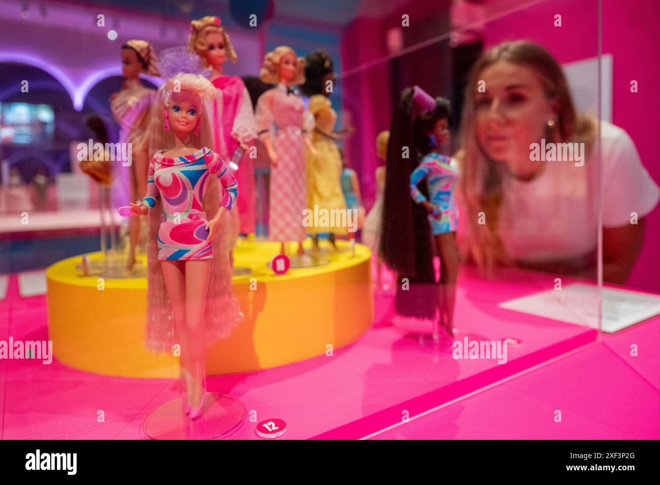 London, UK. 1 July 2024. (L) 'Totally Hair Barbie Doll', 1992, at a ...