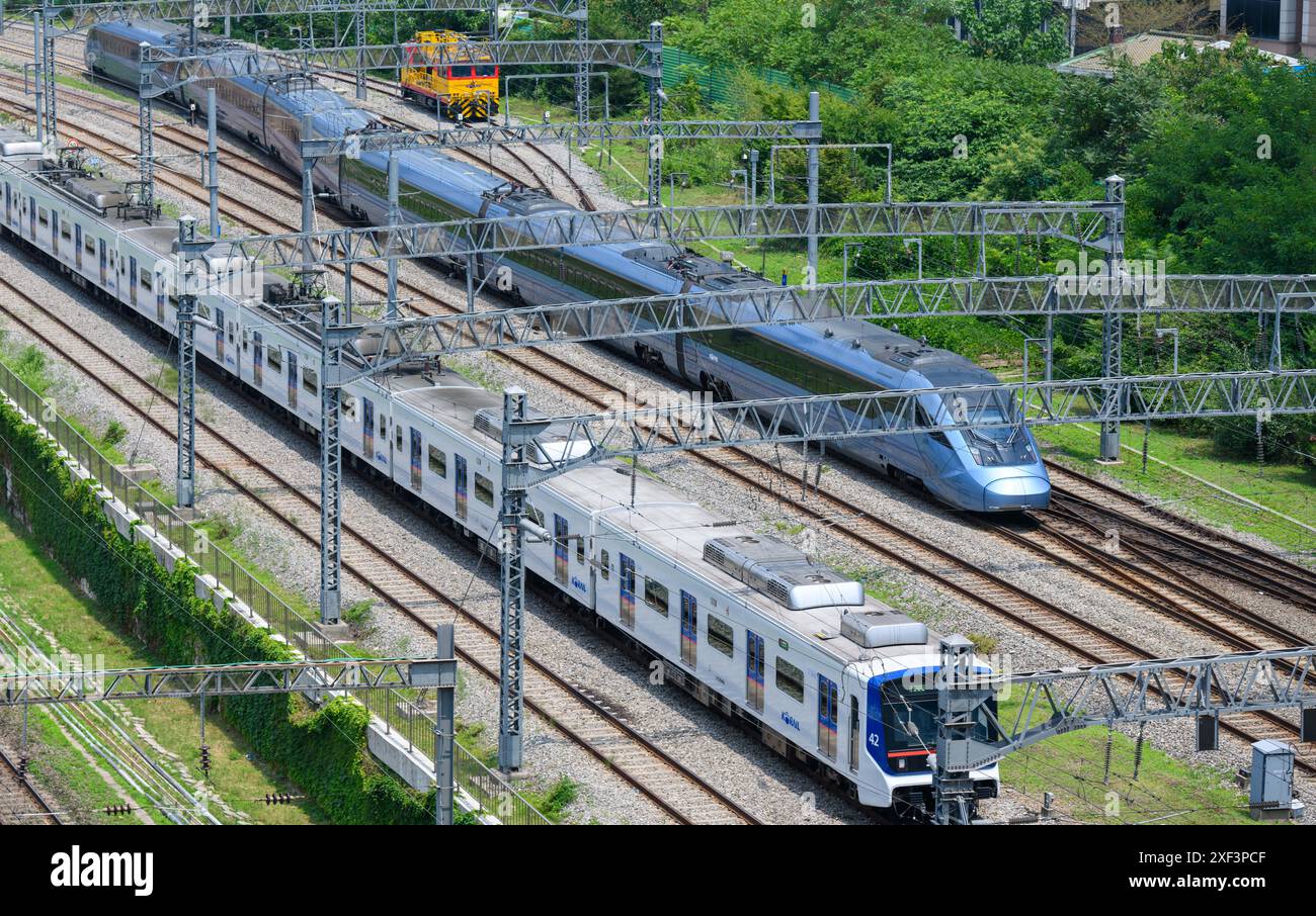 Seoul, South Korea. 01st July, 2024. South Korean train passes between ...