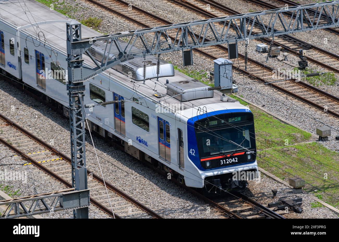 South Korean train passes between Seoul Station and Yongsan Station on ...