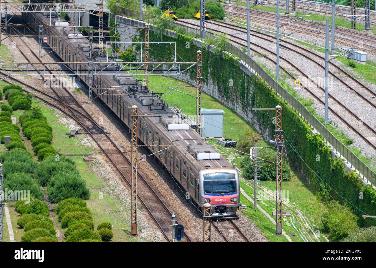 South Korean train passes between Seoul Station and Yongsan Station on ...