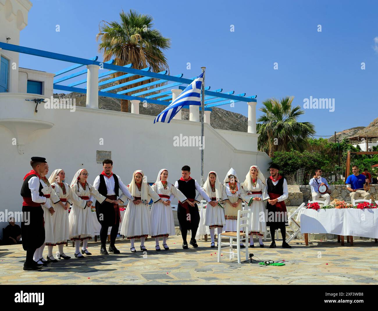 Traditional Greek dancers during the recording of a television ...