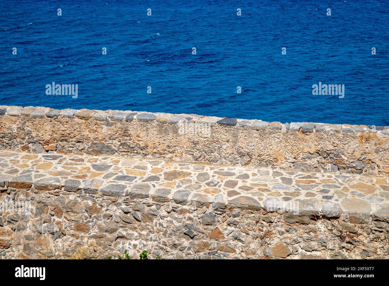 Old stone sea wall hi-res stock photography and images - Alamy