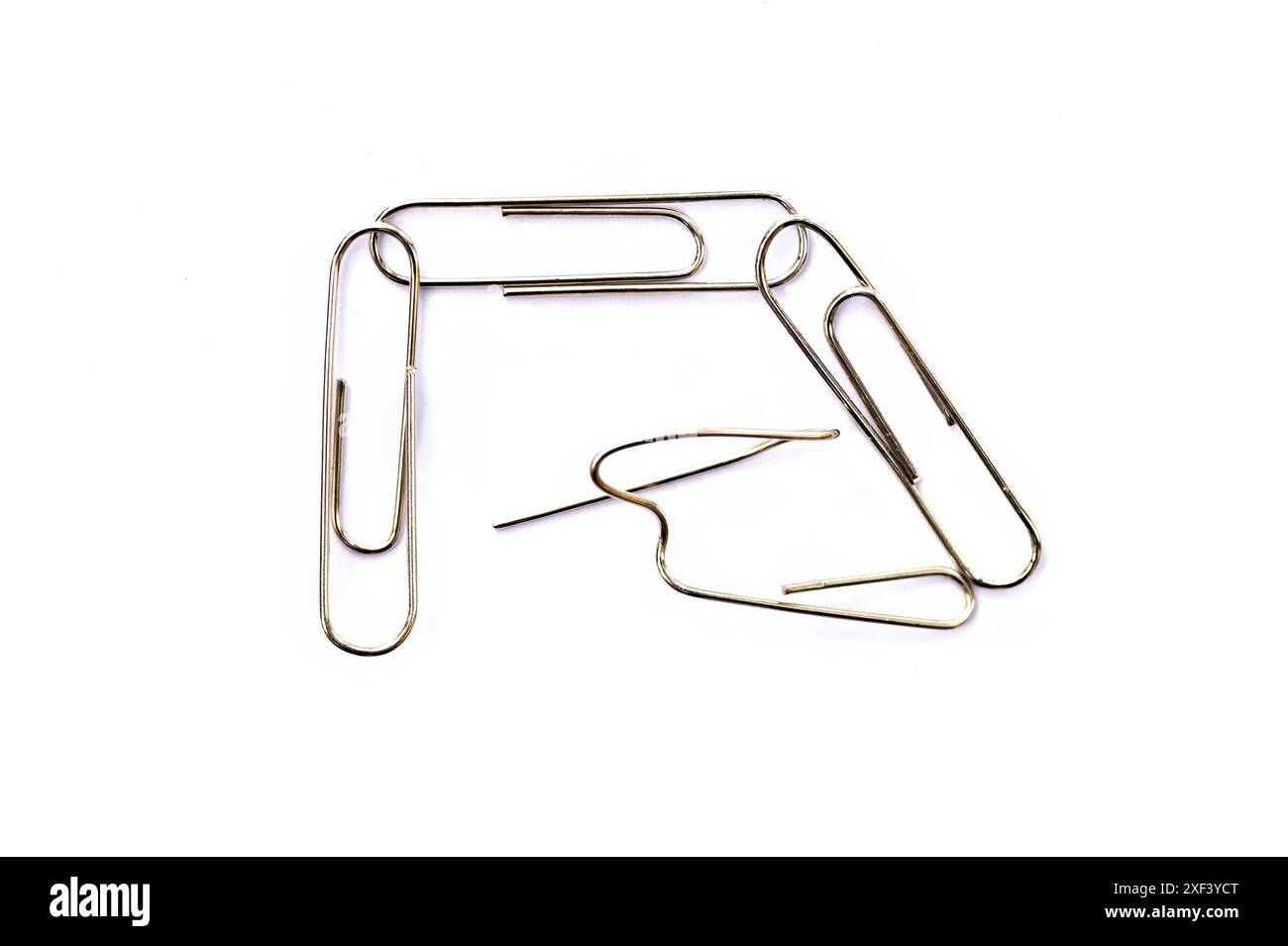 a group of paper clips formed different forms on a white background ...