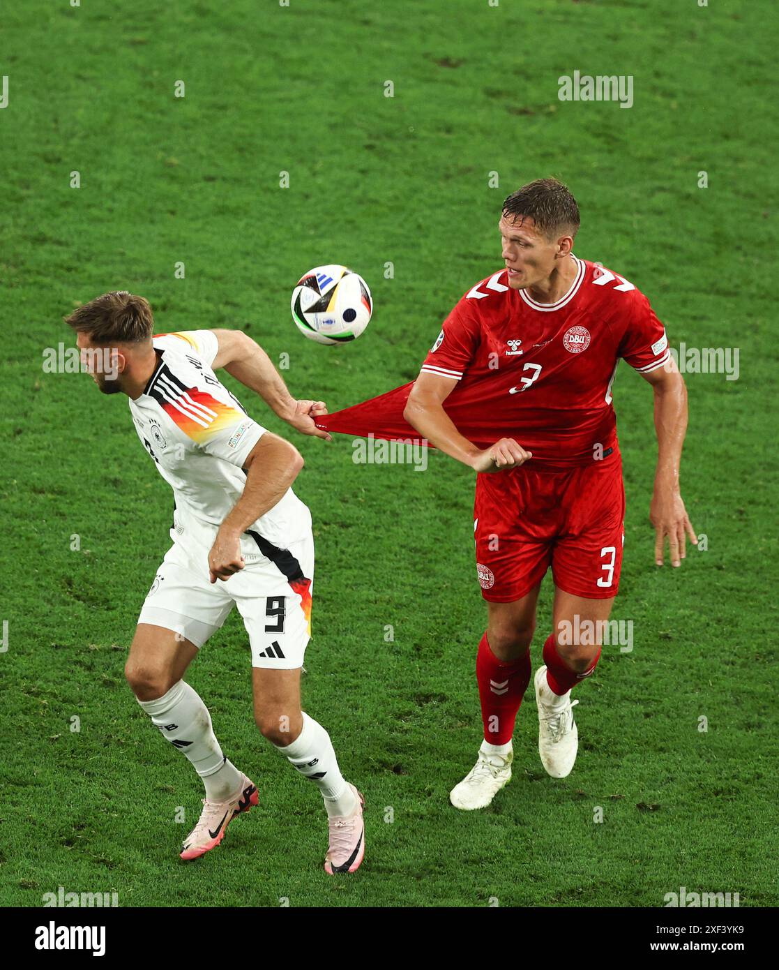 DORTMUND, GERMANY - JUNE 29: Niclas Füllkrug of Germany vies with ...