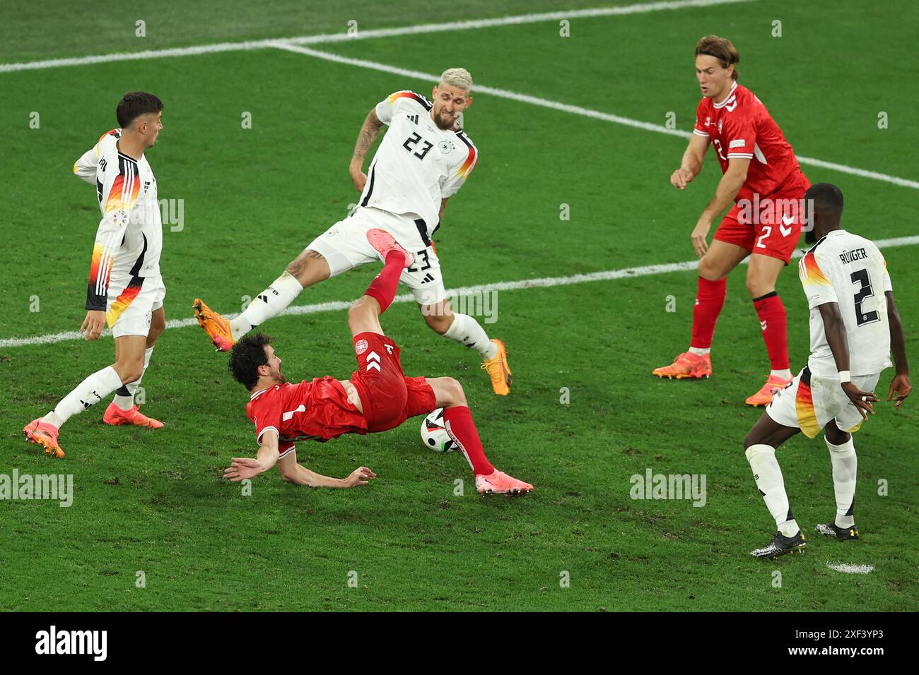 DORTMUND, GERMANY - JUNE 29: Robert Andrich of Germany vies with Thomas ...