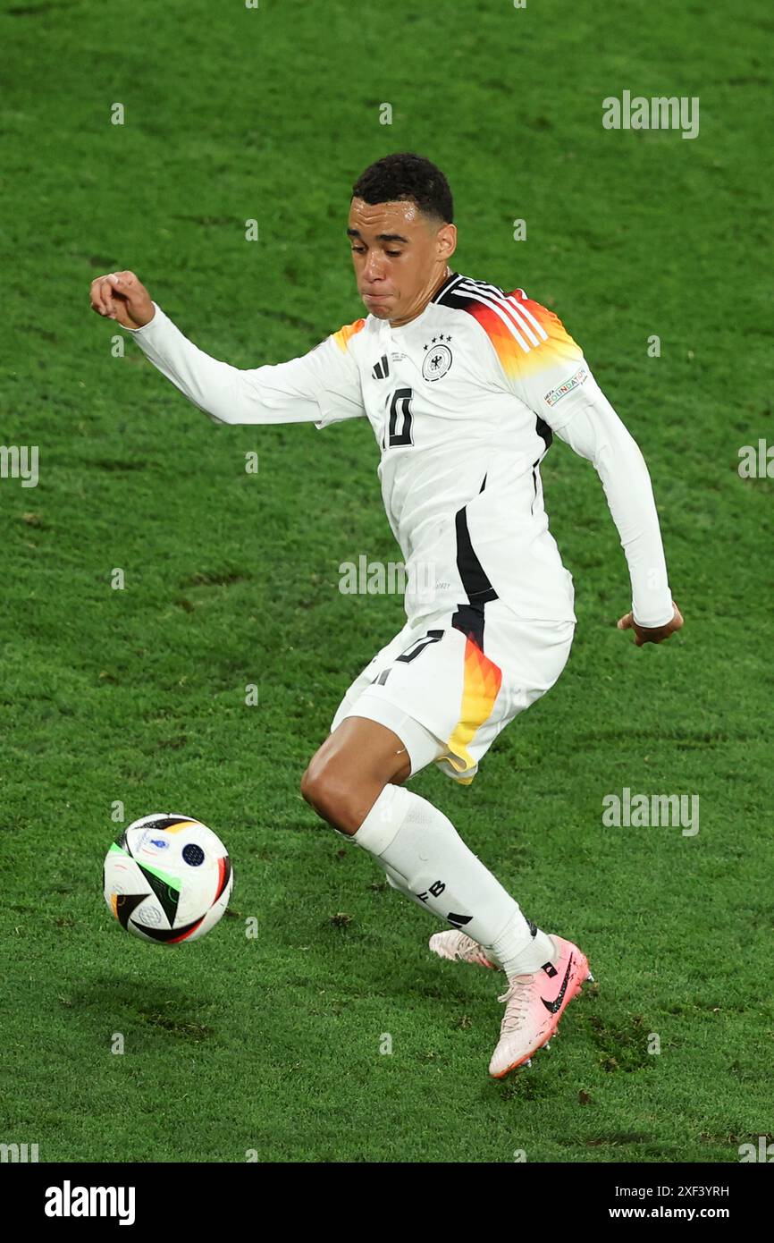DORTMUND, GERMANY - JUNE 29: Jamal Musiala of Germany runs with a ball ...