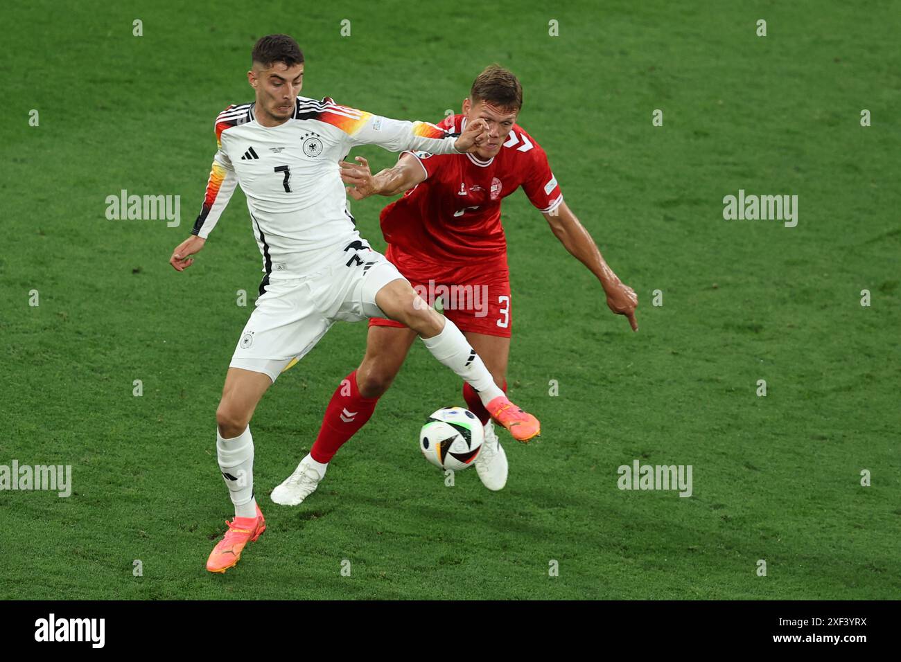 DORTMUND, GERMANY - JUNE 29: Kai Havertz of Germany vies with Jannik ...