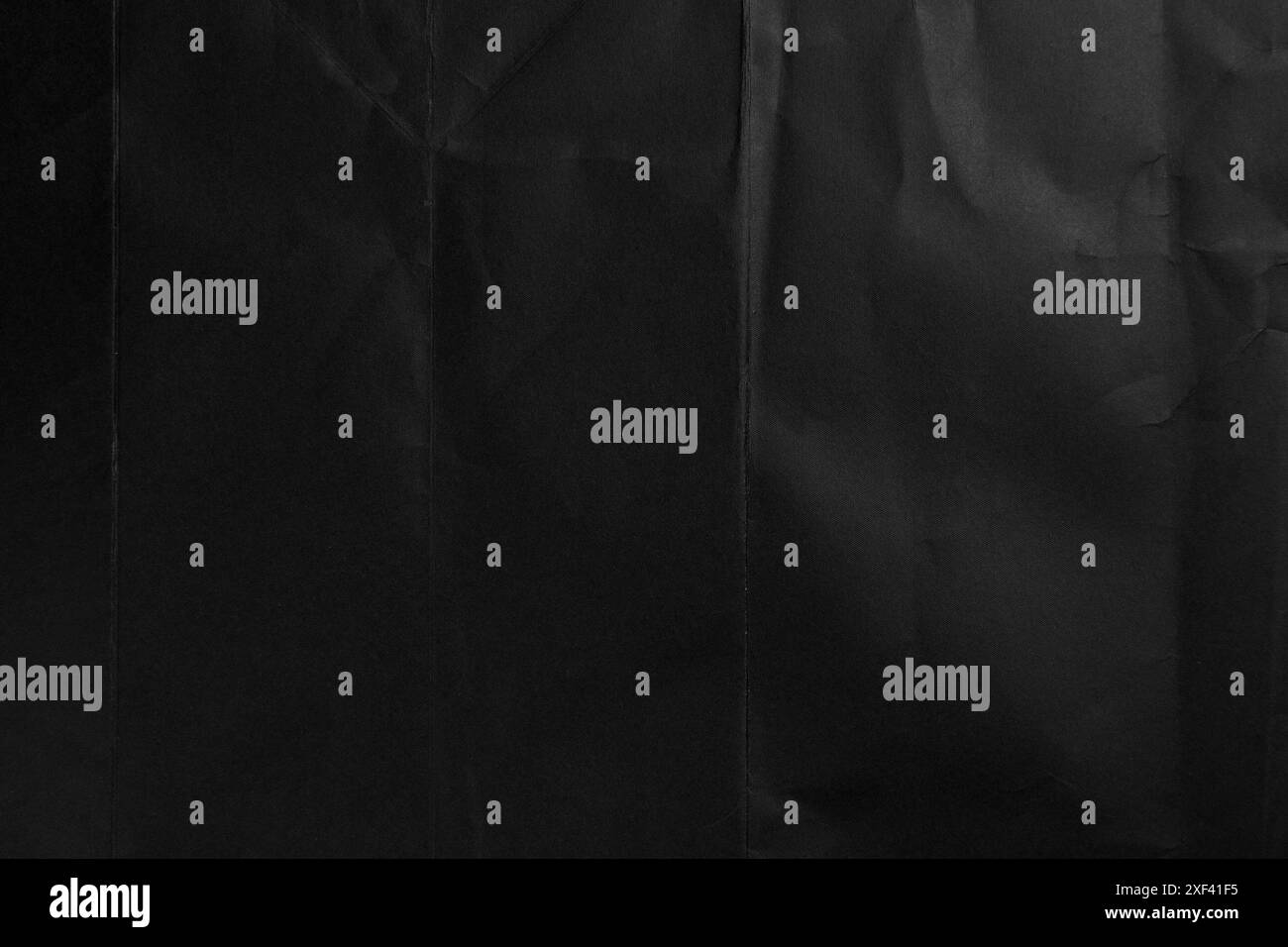 Black old grunge folded paper background with abstract wrinkle lines ...