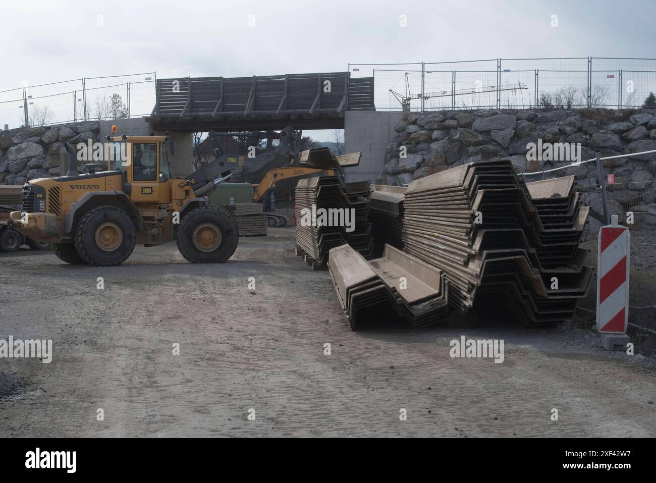 volvo excavator at a construction site, heavy machinery for earthworks ...