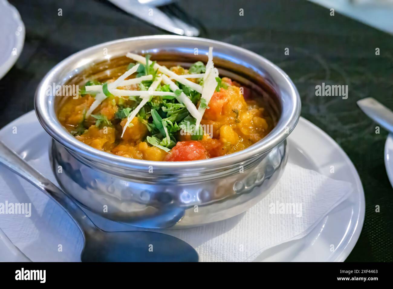 Aloo Gobi, Alu Gobi or Aloo gobhi served to the table in an Indian food ...
