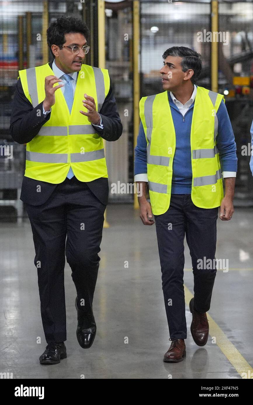 Prime Minister Rishi Sunak talking to Director Haider Choudrey during a ...