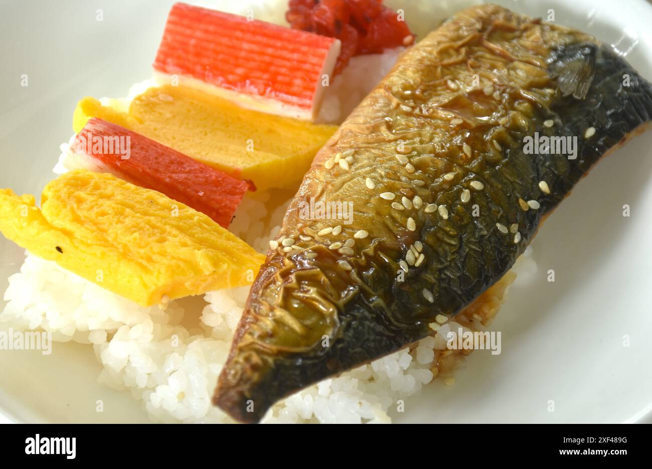 grilled saba fish or mackerel on rice topping sweet egg and crab stick ...