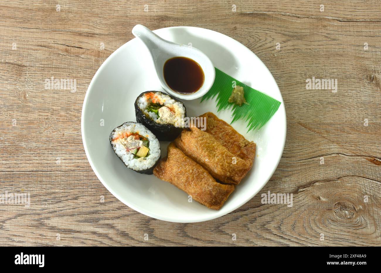 Inari Sushi Japanese food made from rice wrapped by fried tofu and maki ...