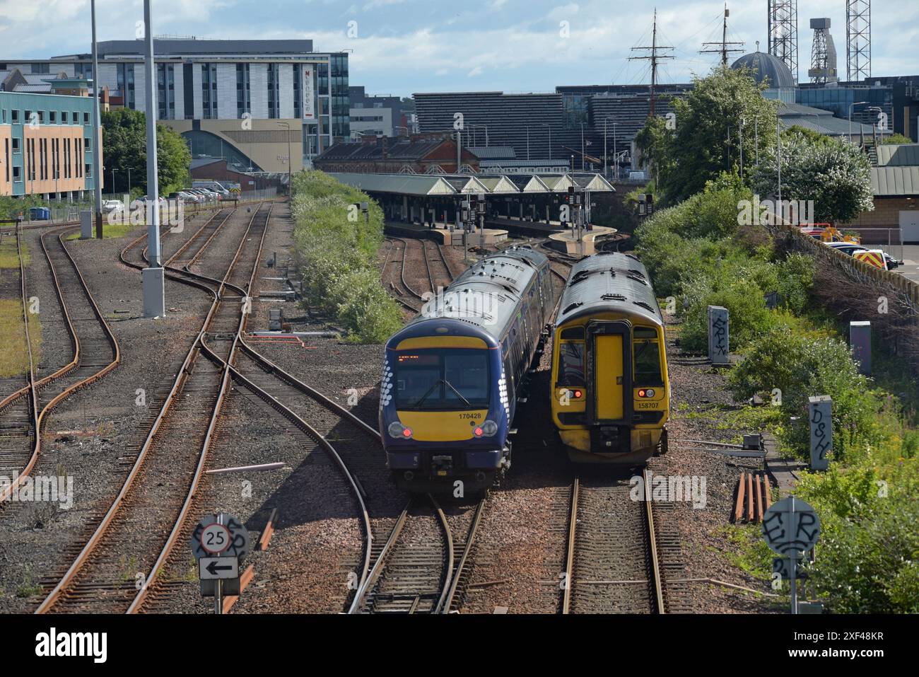 Scotrail Class 158 & 170 trains approaching Dundee Railway Station ...