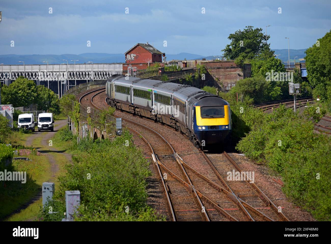 Scotrail train leaving the approach to the Tay river bridge ...