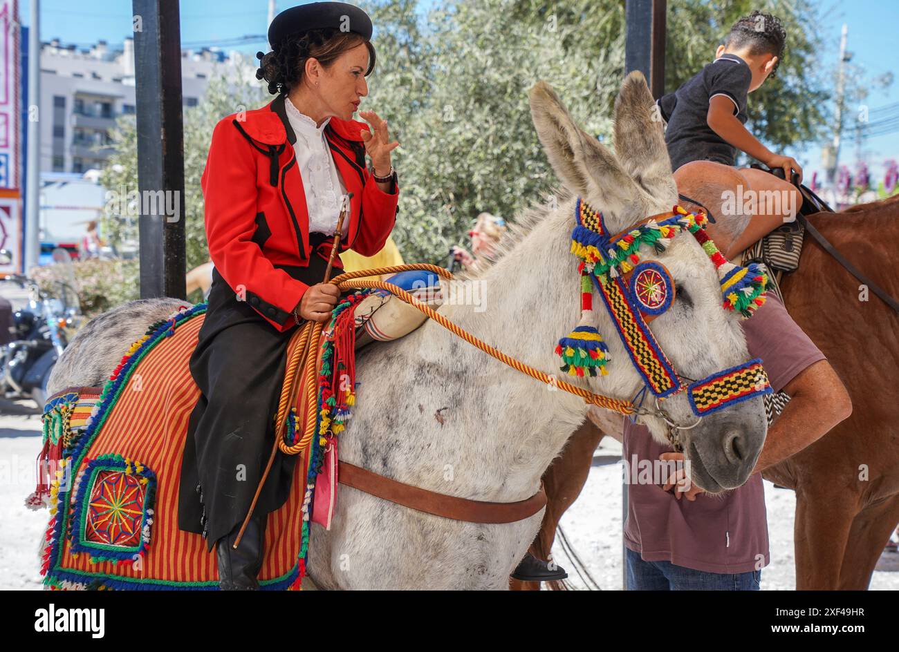 Woman riding donkey hi-res stock photography and images - Alamy
