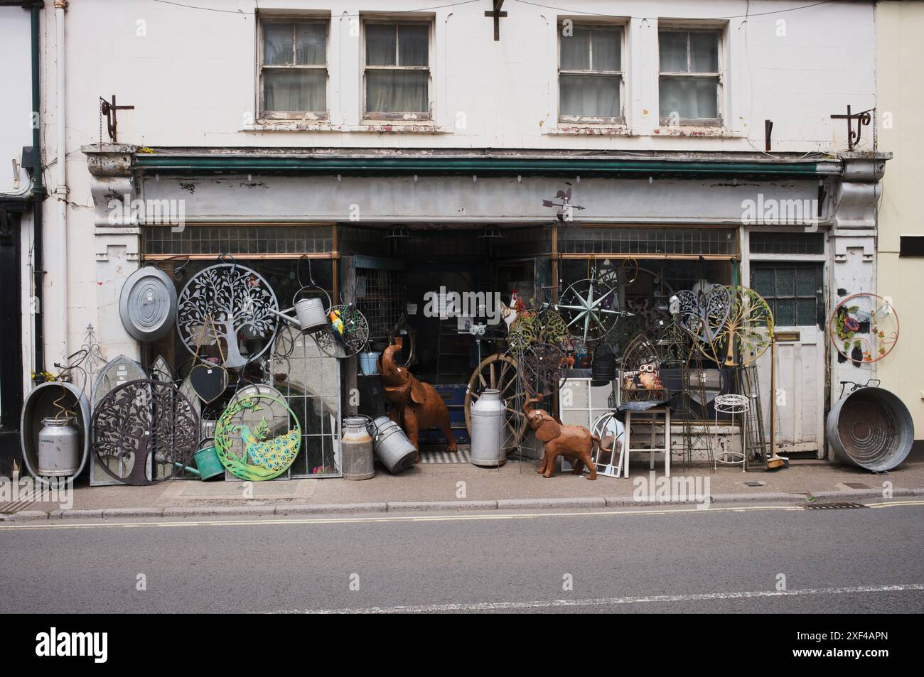 Old run down second hand shop Stock Photo - Alamy
