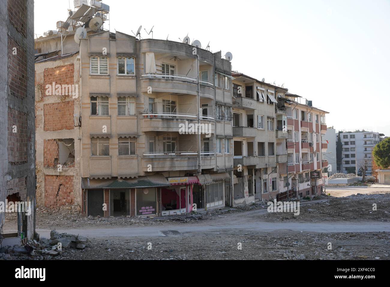 HATAY, TURKIYE - FEBRUARY 26, 2024: Damaged buildings in Hatay City after 6 February 2023 ...