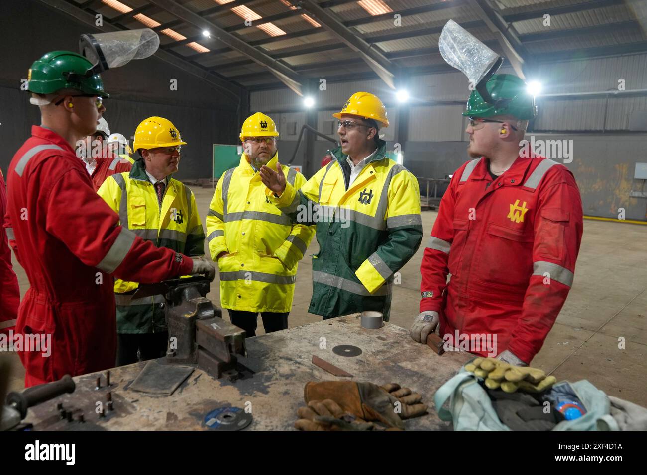 Scottish Labour leader Anas Sarwar chats to workers during a visit to ...
