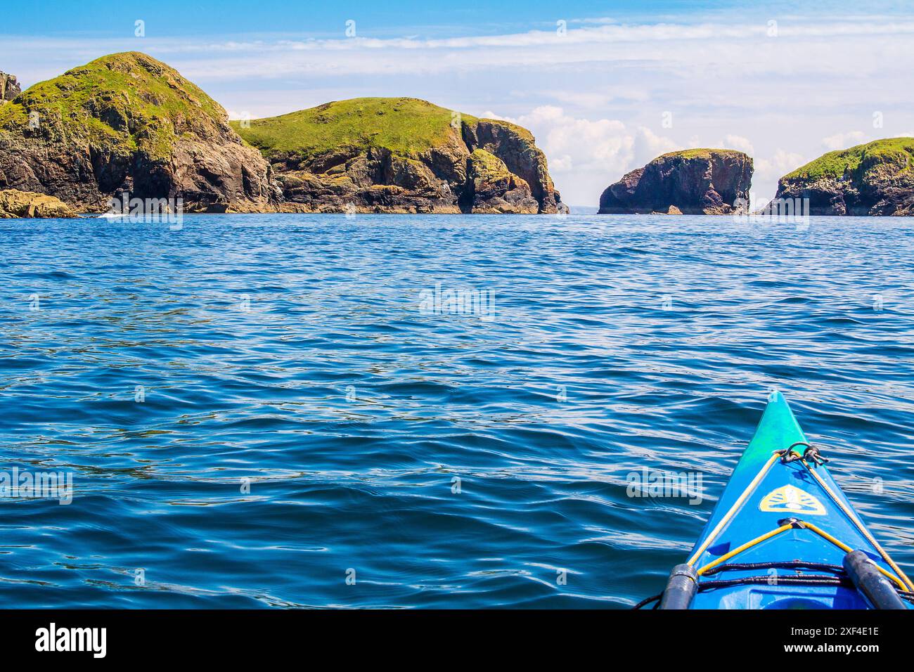 Sea kayaking towards Midland Gap off Ramsey Island and the ...