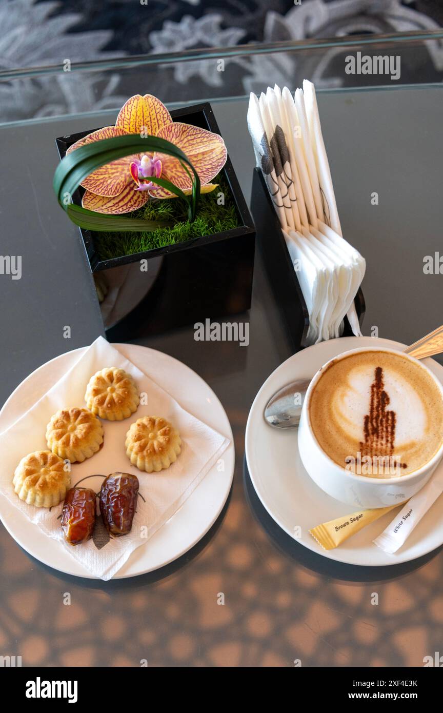 A complimentary cup of traditional Arab coffee, gahwa (Emirati coffee ...