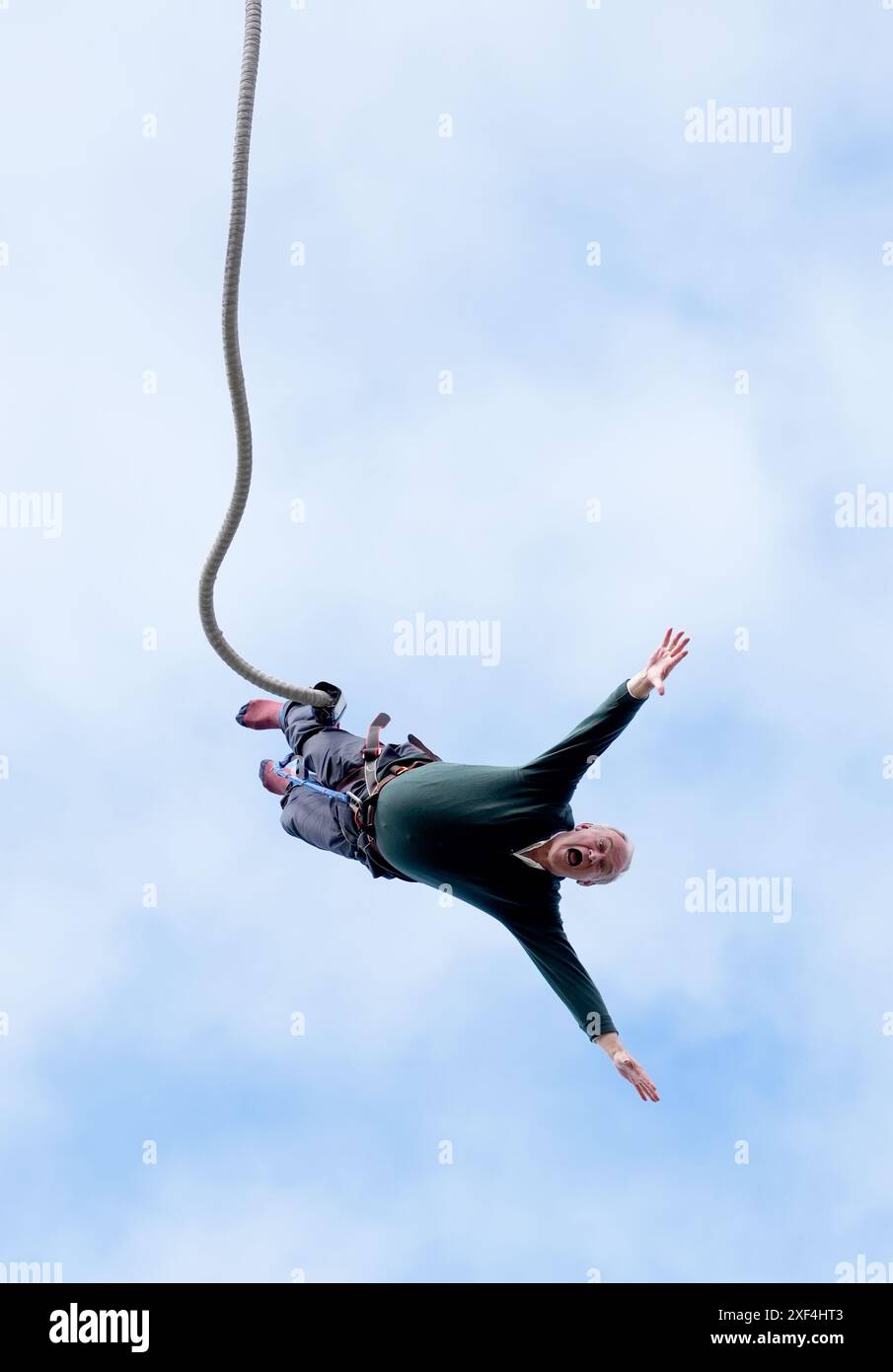 Liberal Democrat leader Sir Ed Davey taking part in a bungee jump ...